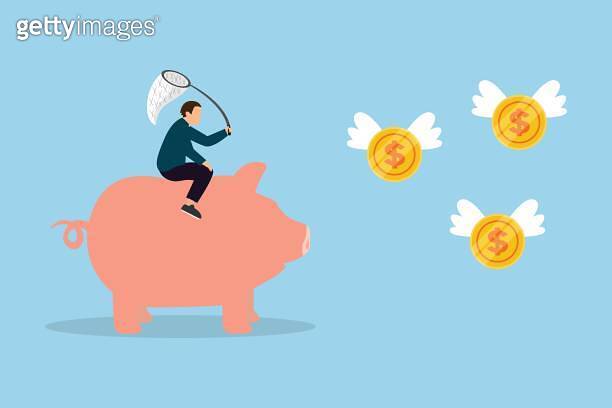 Young man is riding on piggy bank use insect net trying to catch flying ...