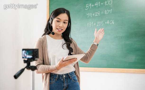 Portrait of asian woman live teaching video camera. Influencer teacher ...