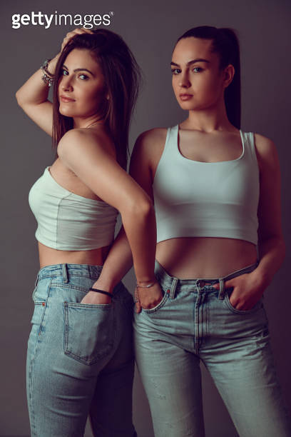 Studio Shot Of Beautiful Female Models Demonstrating Similar Clothing ...