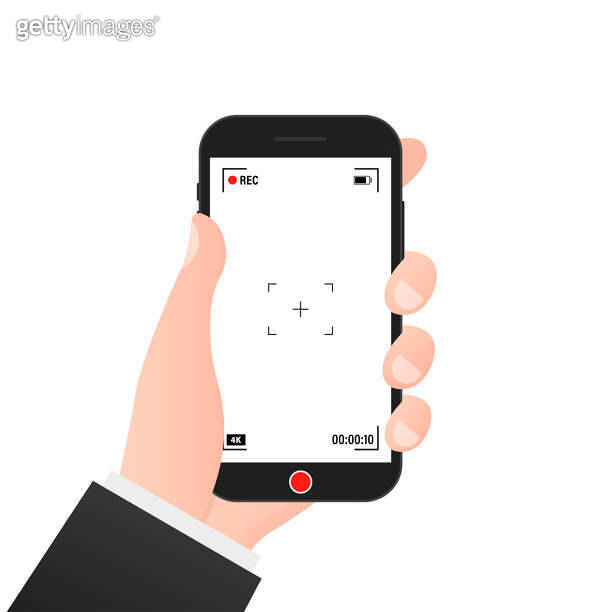 Hand holding the phone. Mobile phone with record frame camera ...