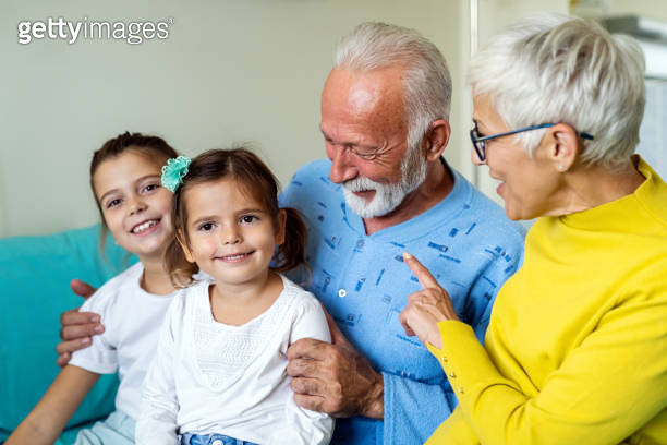 Happy children having fun and love with their grandparents together ...