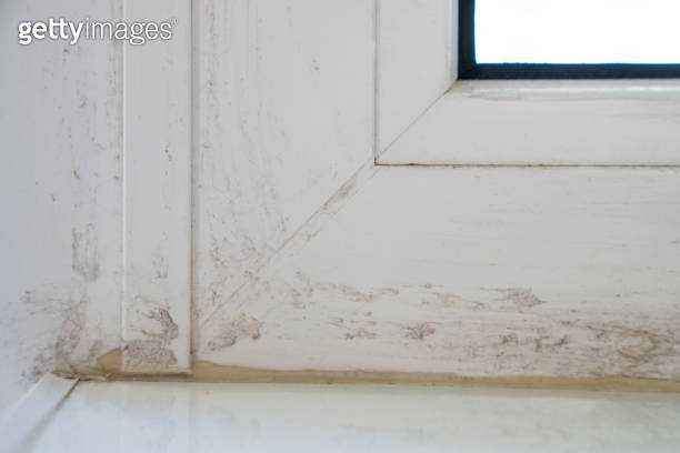 Part of dirty window frame after installing plastic windows and ...