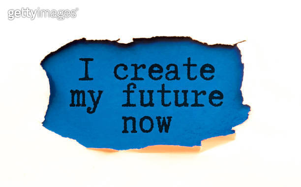 Businessman holding a card with text I CREATE MY FUTURE NOW, business ...