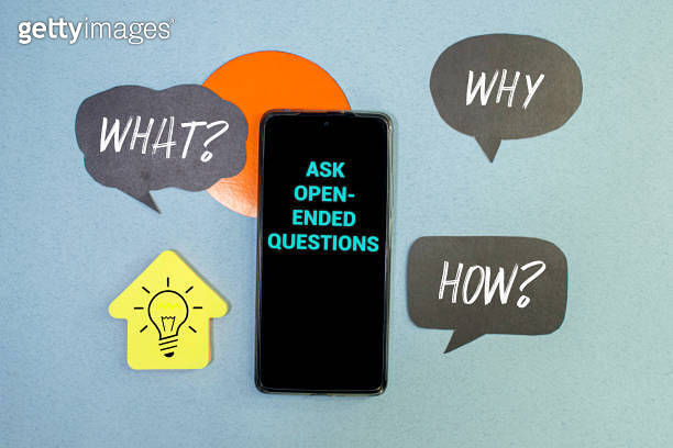 Ask Open-Ended Questions written on a notebook page, pencil on the left ...