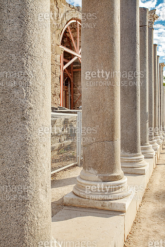 colonnade close-up and dilapidated old columns near the Ancient Theater ...