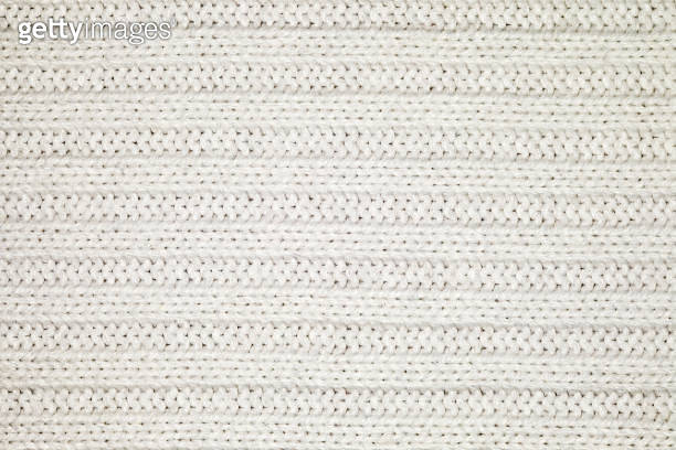 Fabric knitted structure with white threads with pile, background ...