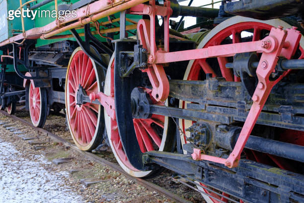 Old steam locomotive wheel and connecting rods. Tie rod or side rod for ...