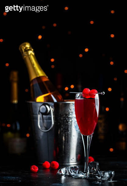 Moulin rouge cocktail drink with calvados, sparkling wine, lychee and ...