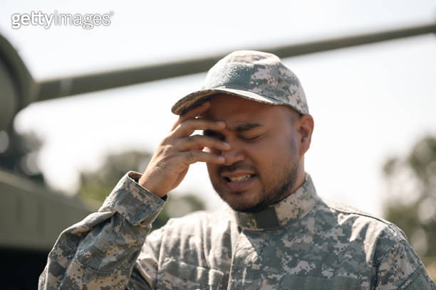 Stressed depressed crying lose war Asian man special forces soldier ...
