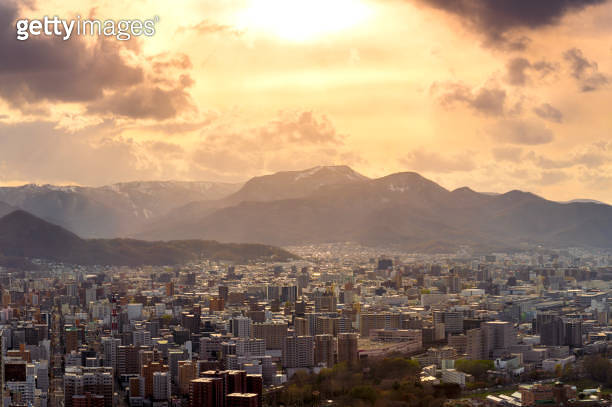sunset or sun rise of Sapporo cityscape with Skyline and office ...