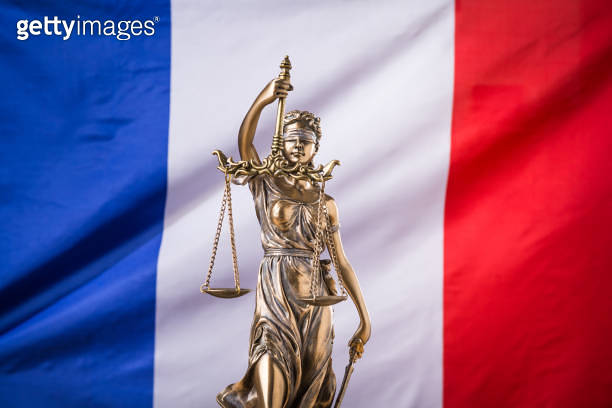 The statue of justice Themis or Justitia, the blindfolded goddess of ...