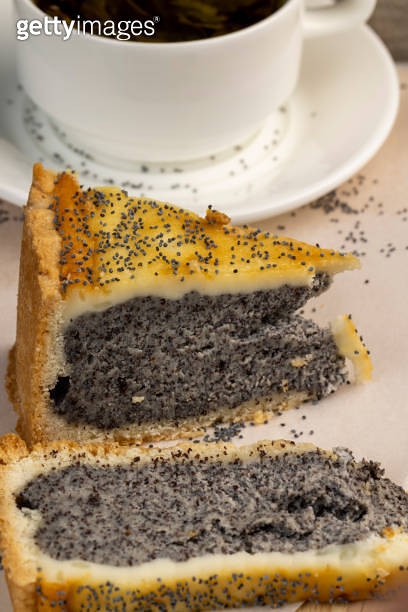 a cut piece of cake with poppy seed filling (1470683340) - 게티이미지뱅크