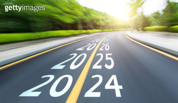 Blurred road with new year number 2024 change 2025 2026 and 2027 ...