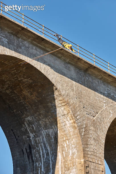 Bungee jumping from a bridge. Extreme sports. Adrenaline. Risk ...