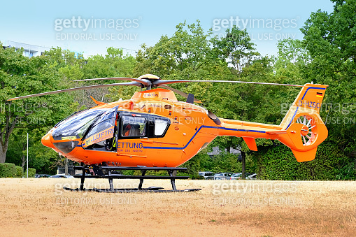 modern Red paramedic ambulance emergency aircraft Germany on helipad ...