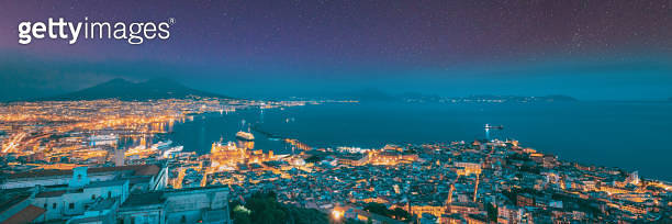 Naples, Italy. Skyline Cityscape In Evening Lighting. Tyrrhenian Sea ...