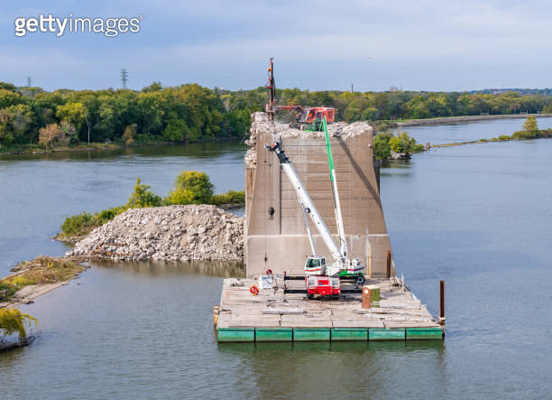 Demolition of old I-74 bridge near Davenport, Iowa on Mississippi river ...