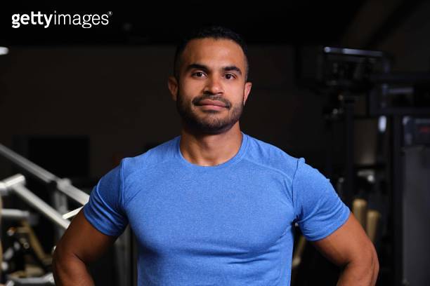 Portrait of a strong Latin man at a gym looking at camera. (1637357081 ...
