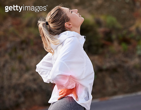 Woman, back pain and exercise, fitness injury and muscle ache ...