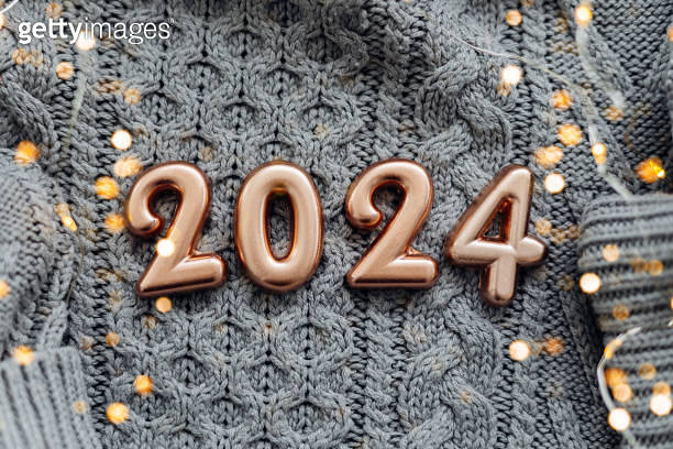 Christmas and New Year Greeting Card. Number 2024 on knitted gray ...