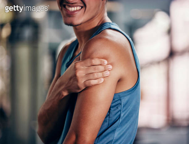 Sports injury, pain and arm massage at gym after accident during ...