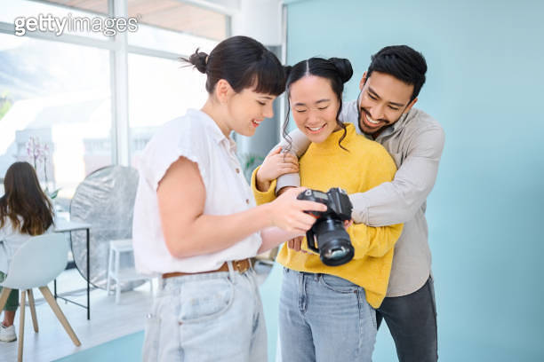 Photography, camera and team check photo results, creative memory ...