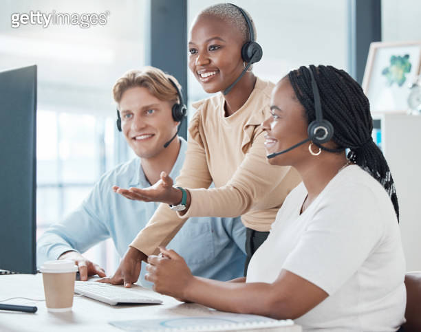 Training, teamwork and call center team in office on computer working ...