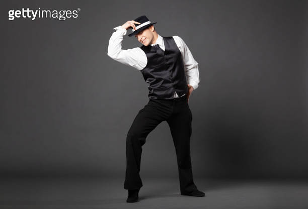 Confident young man dancing in gangster style suite. 이미지 (1461437027 ...