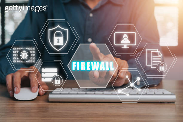 Firewall computing security concept, Person working on computer with ...
