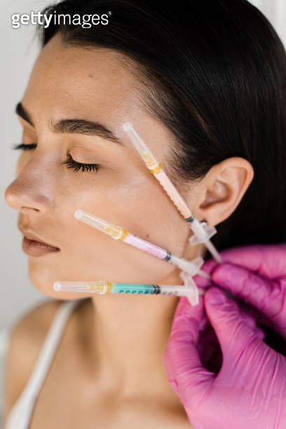 Girl with vitamin cocktail syringes for injections. Mesotherapy ...