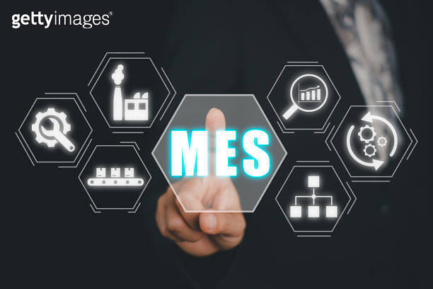 MES - Manufacturing Execution System concept, Businessman hand touching ...