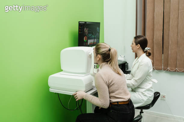 Optical coherence tomography OCT scan to create pictures of the back of ...