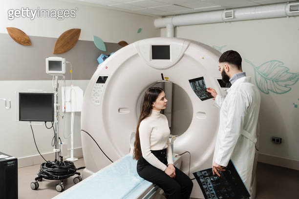 Computed tomography CT scan process for examination of spine ...