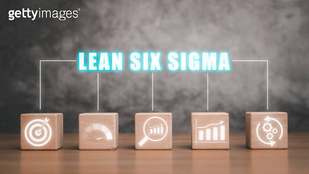 Lean Six Sigma concept, Wooden block on wooden desk with lean six sigma ...