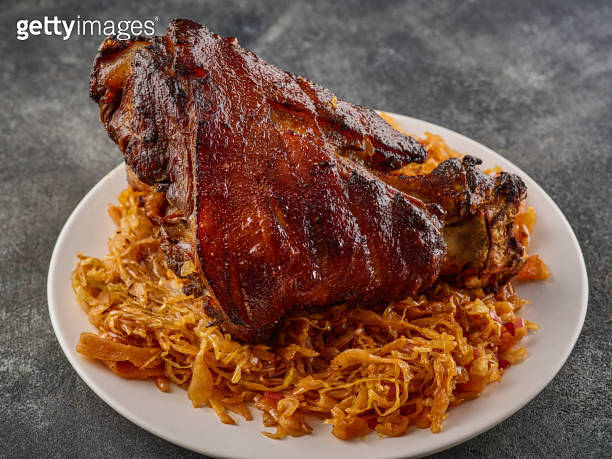 Traditional German cuisine, Schweinshaxe roasted ham hock with ...