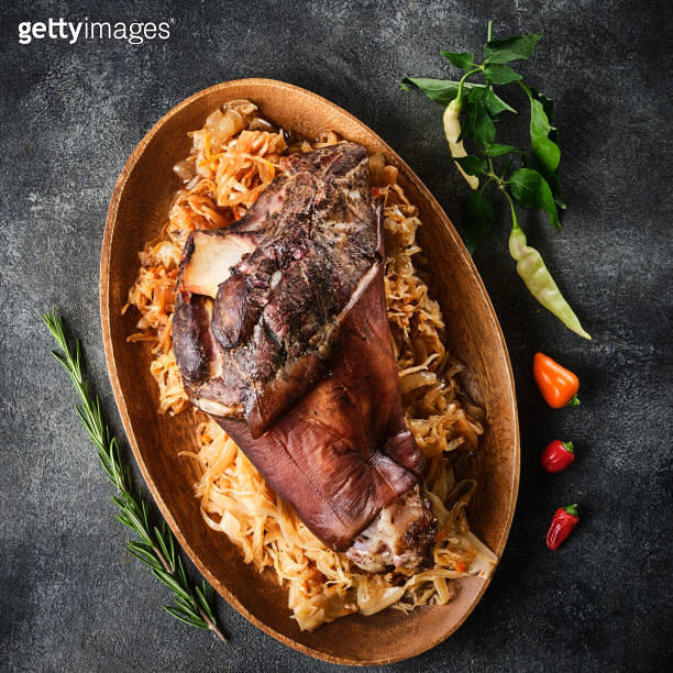 Traditional German cuisine, Schweinshaxe roasted ham hock with ...