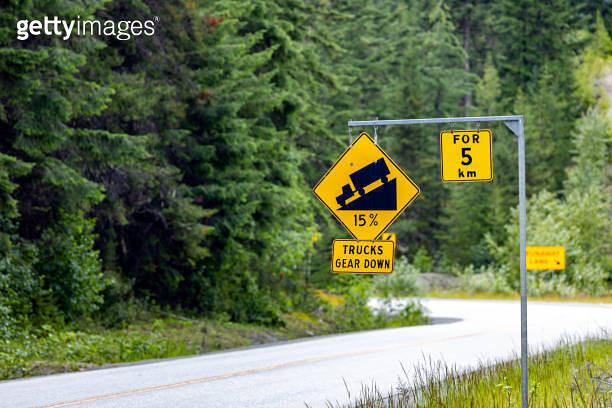 Steep Hill Descent Use Low Gear Traffic Sign on the Highway 99, British ...