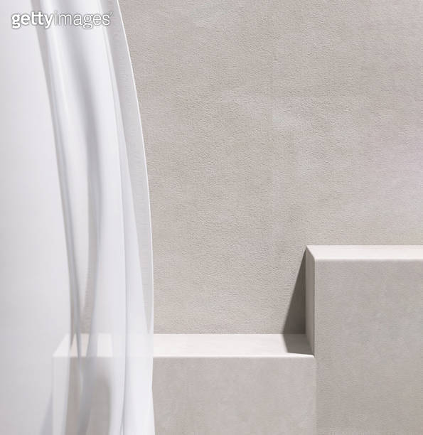 Two geometric design concrete step podium, white blowing curtain in ...