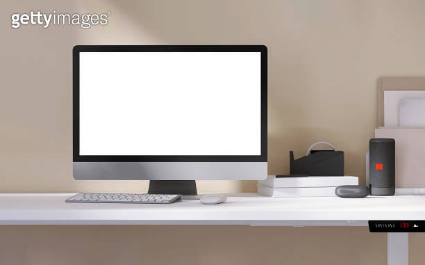 Blank screen modern desktop computer, keyboard, mouse, book, document and speaker on minimal ...