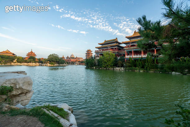 Chinese style garden scenery, ancient architectural attic on the lake ...