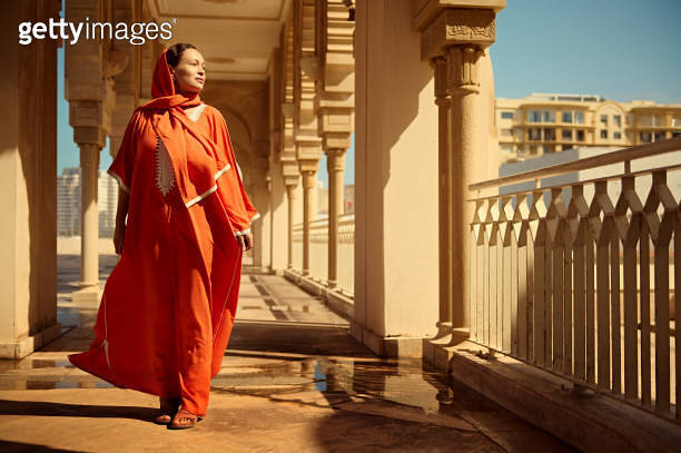 Full length portrait gorgeous Arab Muslim woman in traditional strict ...
