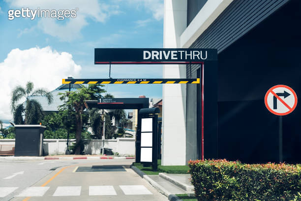 Drive thru sign in fast food restaurant. Drive thru sign into the shop ...
