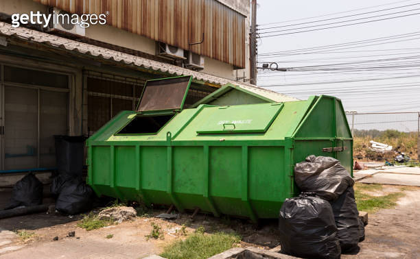 Dumpsters being full Overflowing garbage bins with household waste ...