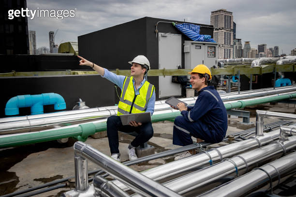 Industrial engineer work on site. engineer visit and inspection site ...