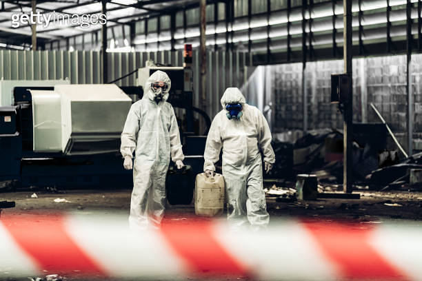 Scientist wear Chemical protection suit check danger chemical, working ...