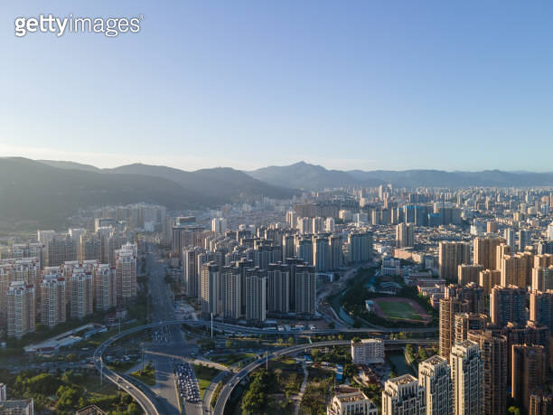 Aerial view of the road beside the building in the urban residential ...