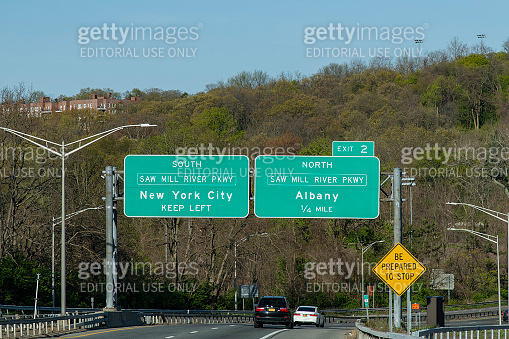 Overhead road signs at exit 2 in the direction of New York City ...