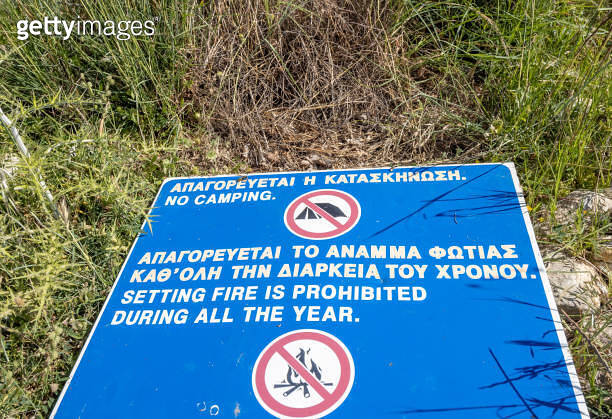 Warning Sign on Dionyssos Beach at Rethymno Province in Crete, Greece ...