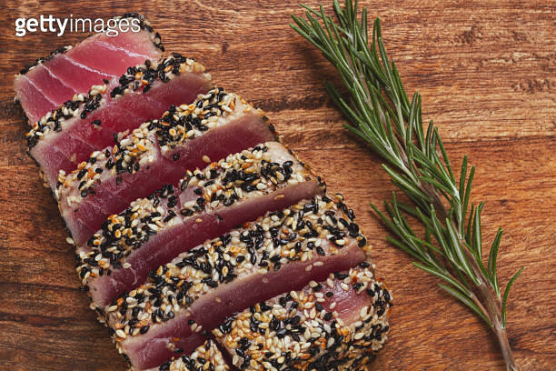 fillet of red tuna meat, fried in sesame seeds, homemade, close-up, no ...