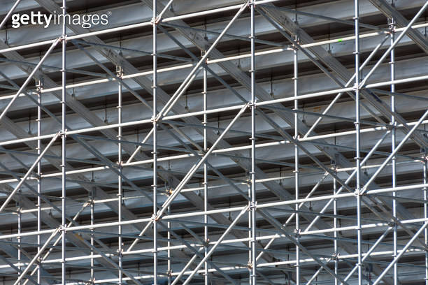 Metal pipe frame structure. Industrial construction from tubes raises ...